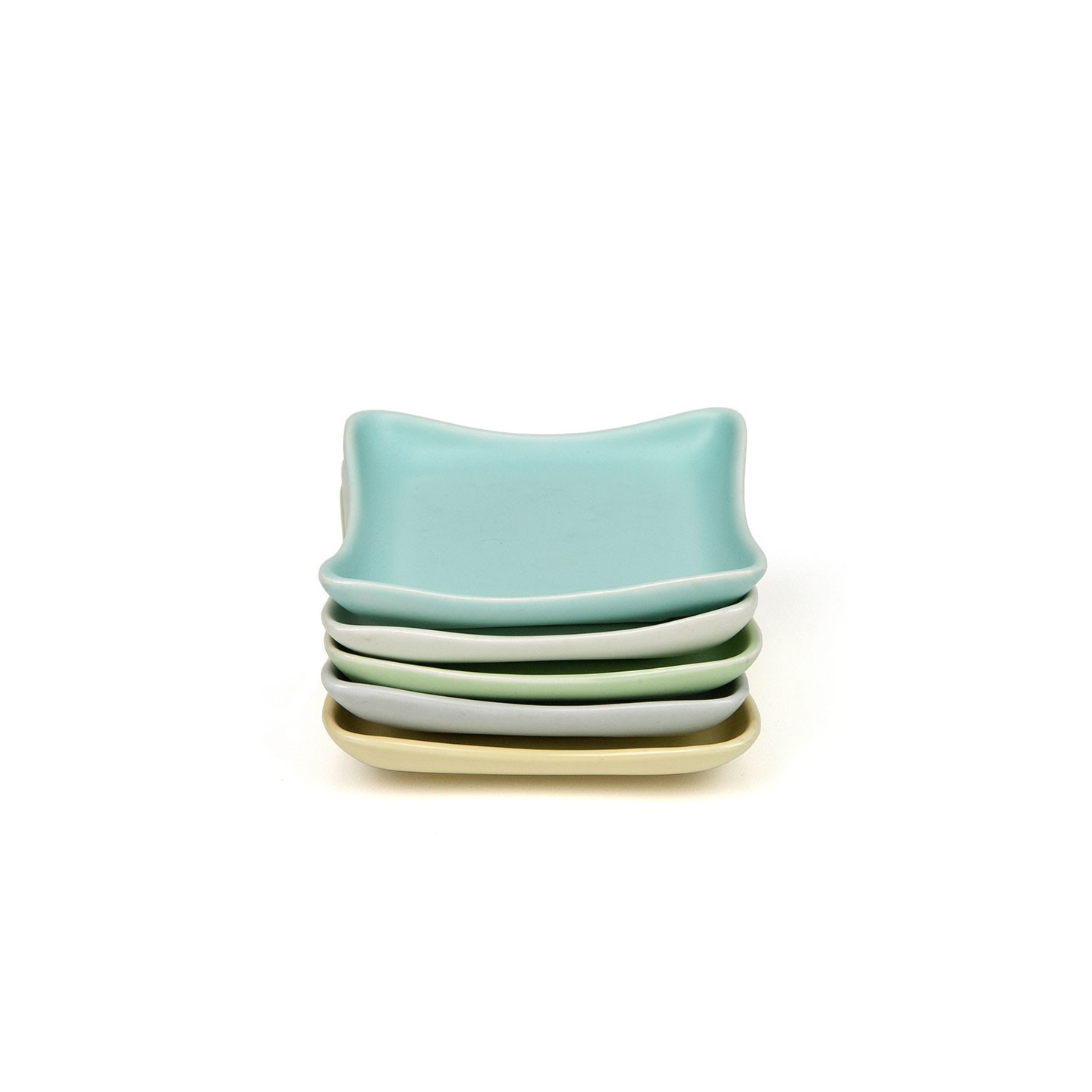 Set of small vintage serving dishes in pastel colors from